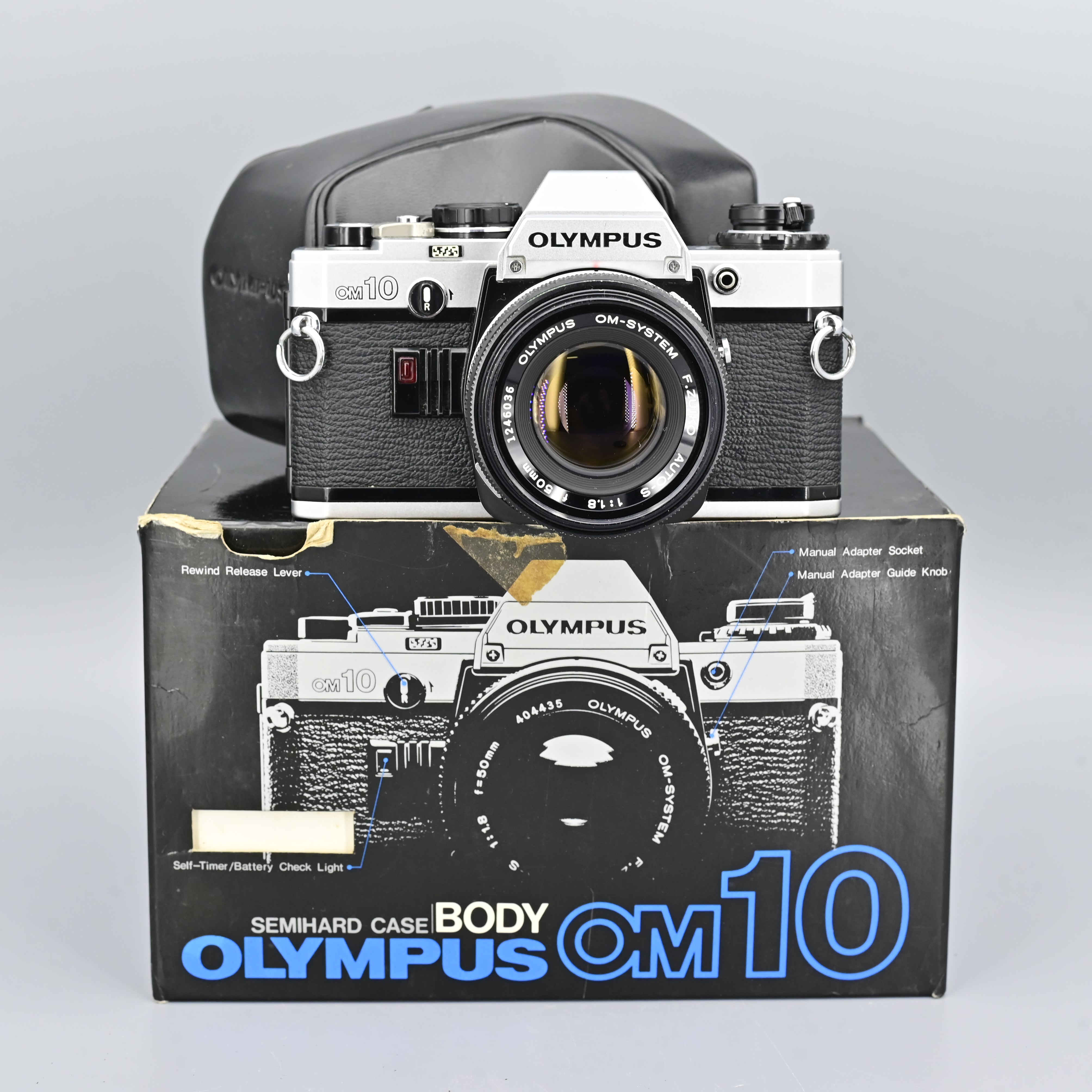 Olympus OM10 + Auto-S 50mm F1.8 Lens (with Box) – SHOWA
