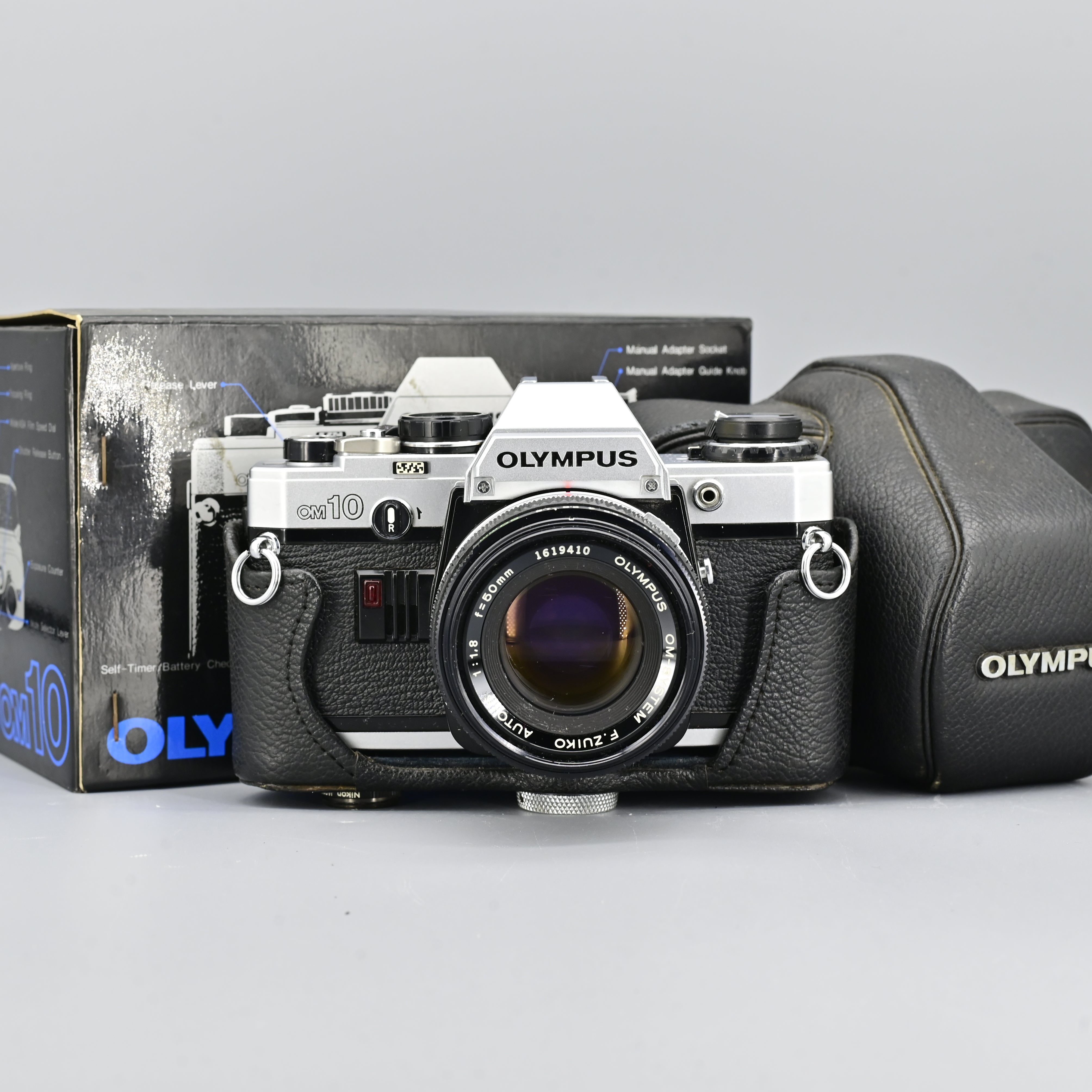 Olympus OM10 + Auto-S 50mm F1.8 Lens (with Box) – SHOWA